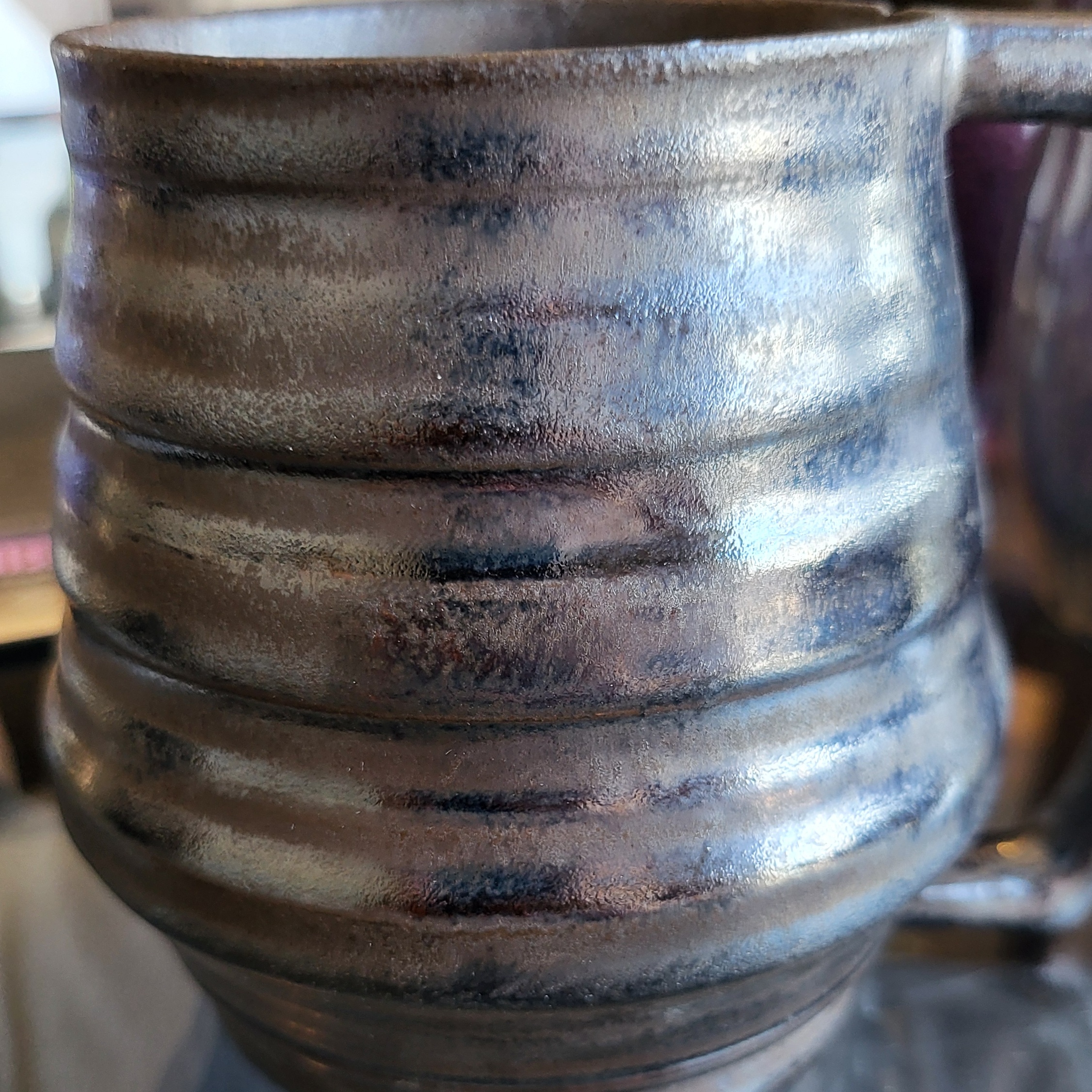 Tenmoku over Saturation Gold | glazeshare