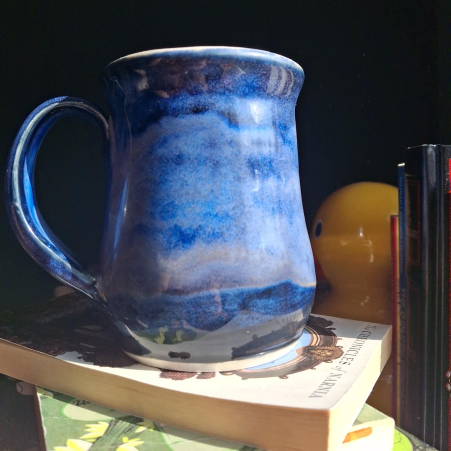 Honey Flux and Indigo Float over Obsidian | glazeshare