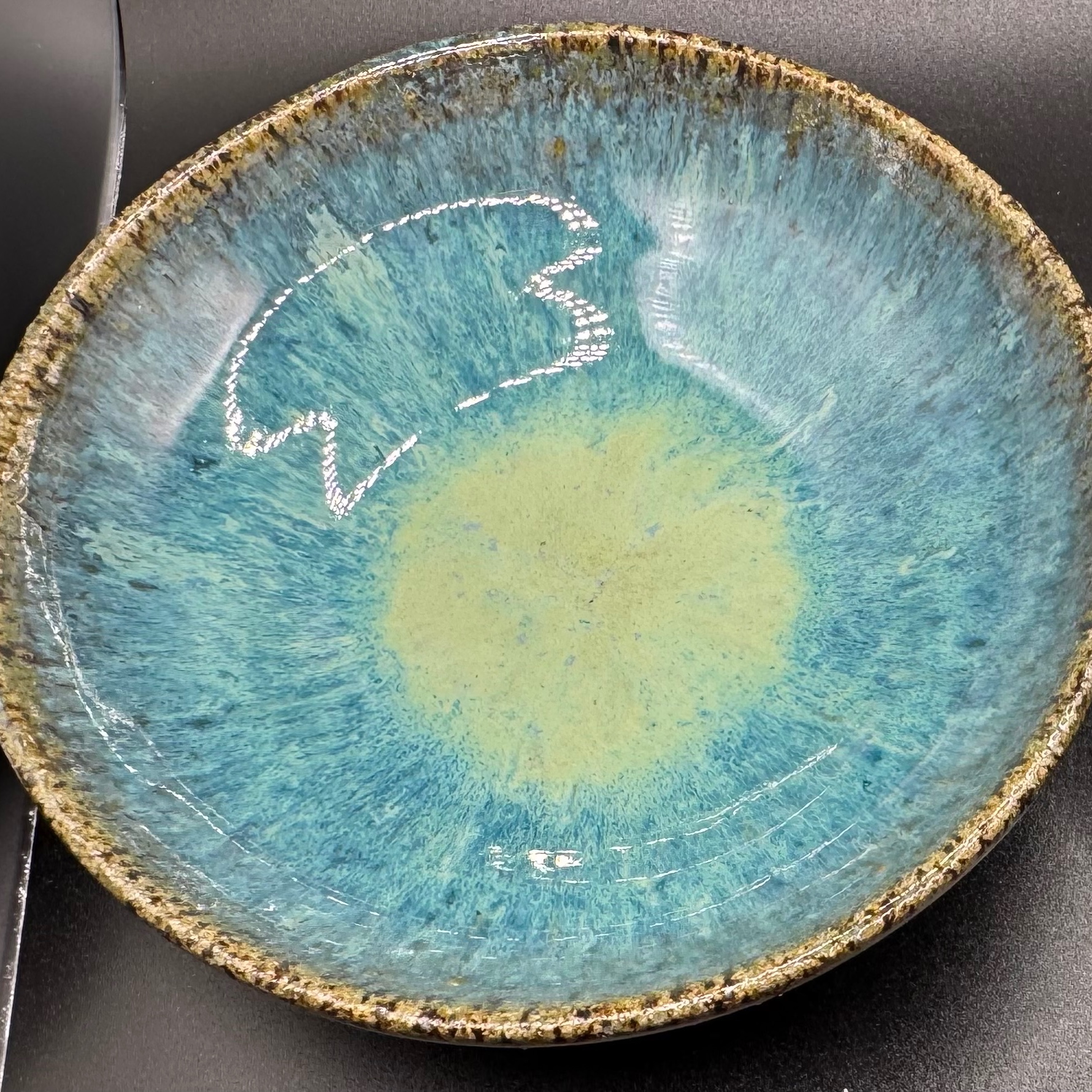 Amaco Textured Turquoise under Blue Lagoon | glazeshare