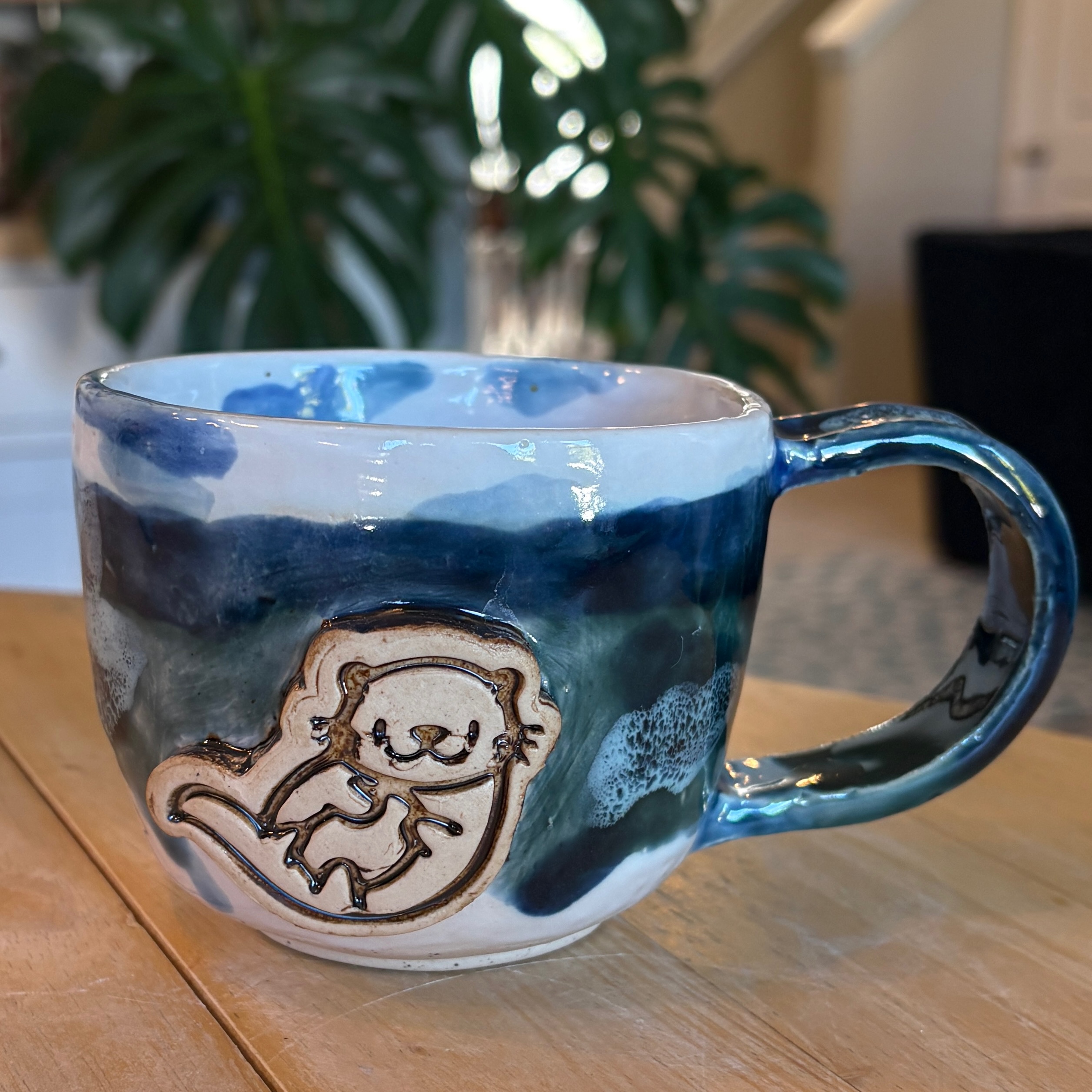 Snow and Rainforest and Storm Otter Mug | glazeshare