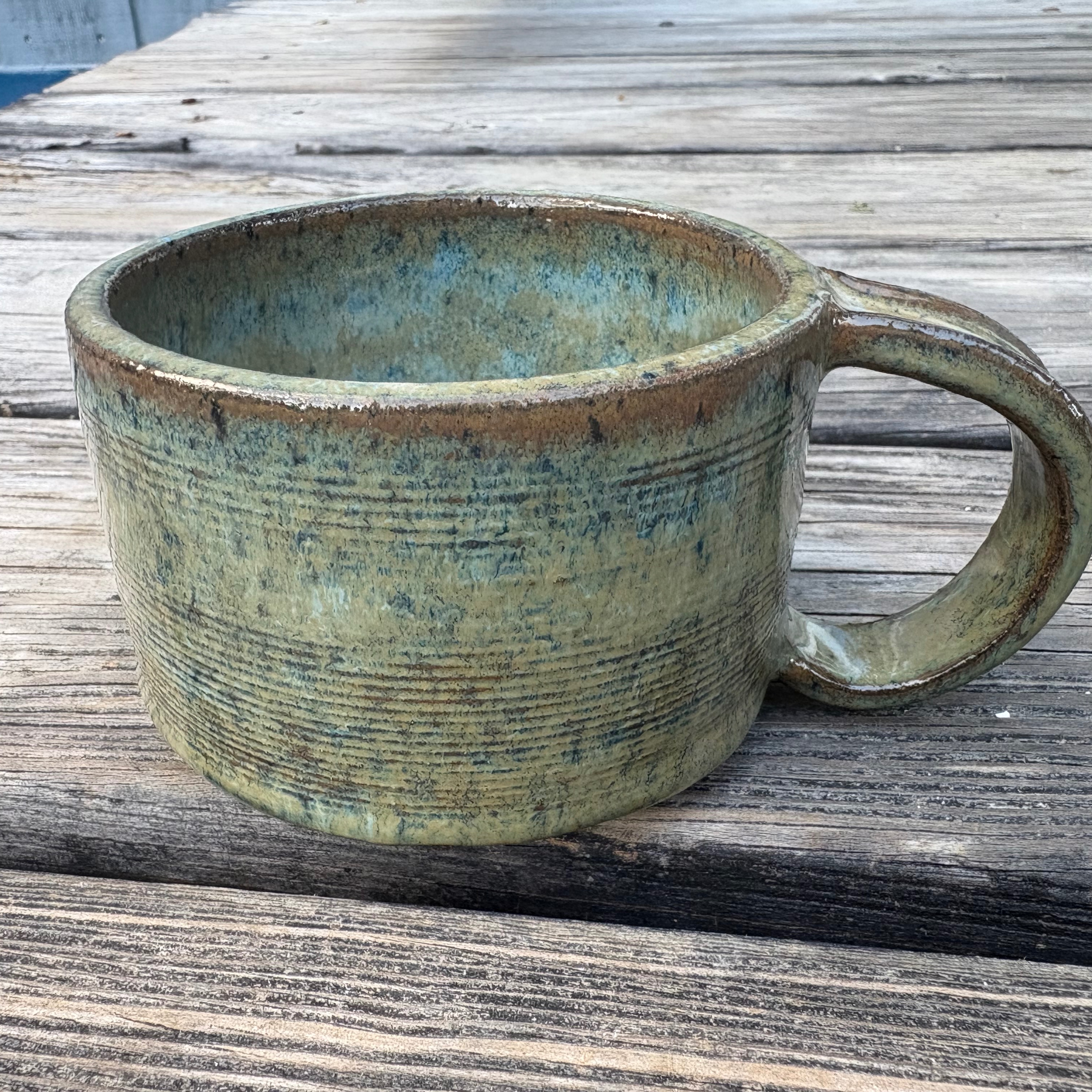 Indigo float over iron lustre | glazeshare
